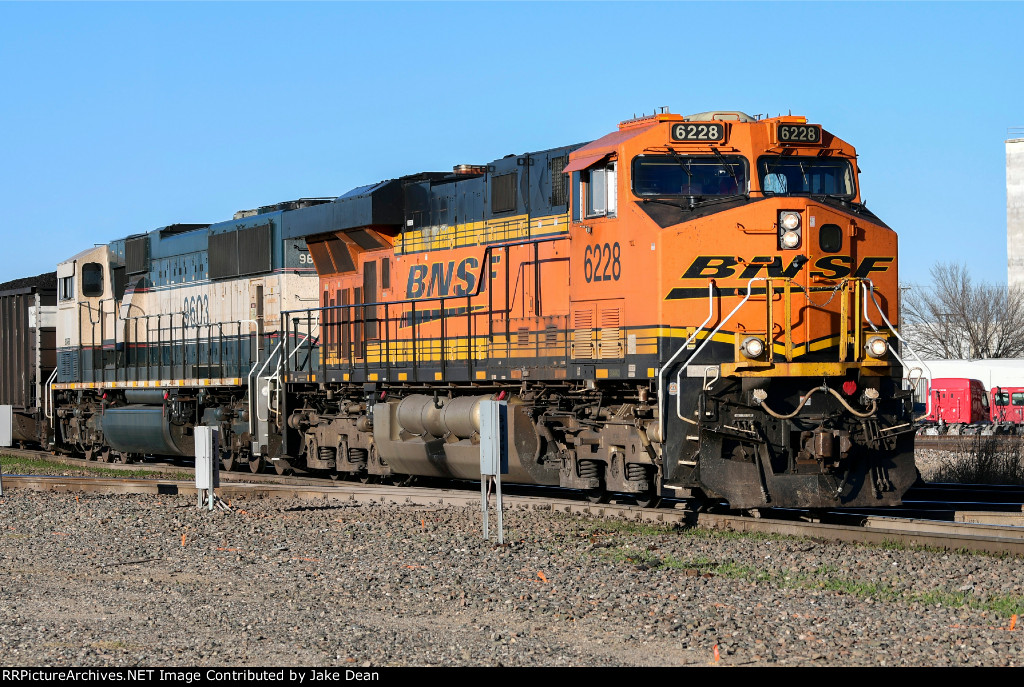 BNSF 6228 and BNSF 9603 pushing a coal train out of